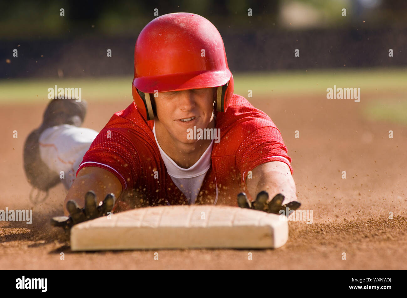 Baseball Player Sliding Into Base Stock Photo - Alamy