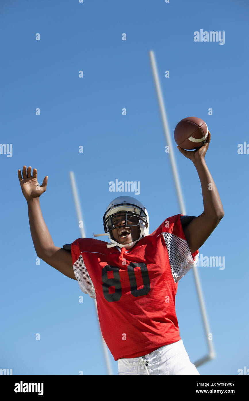 Football Player Celebrating Touchdown Stock Photo - Alamy