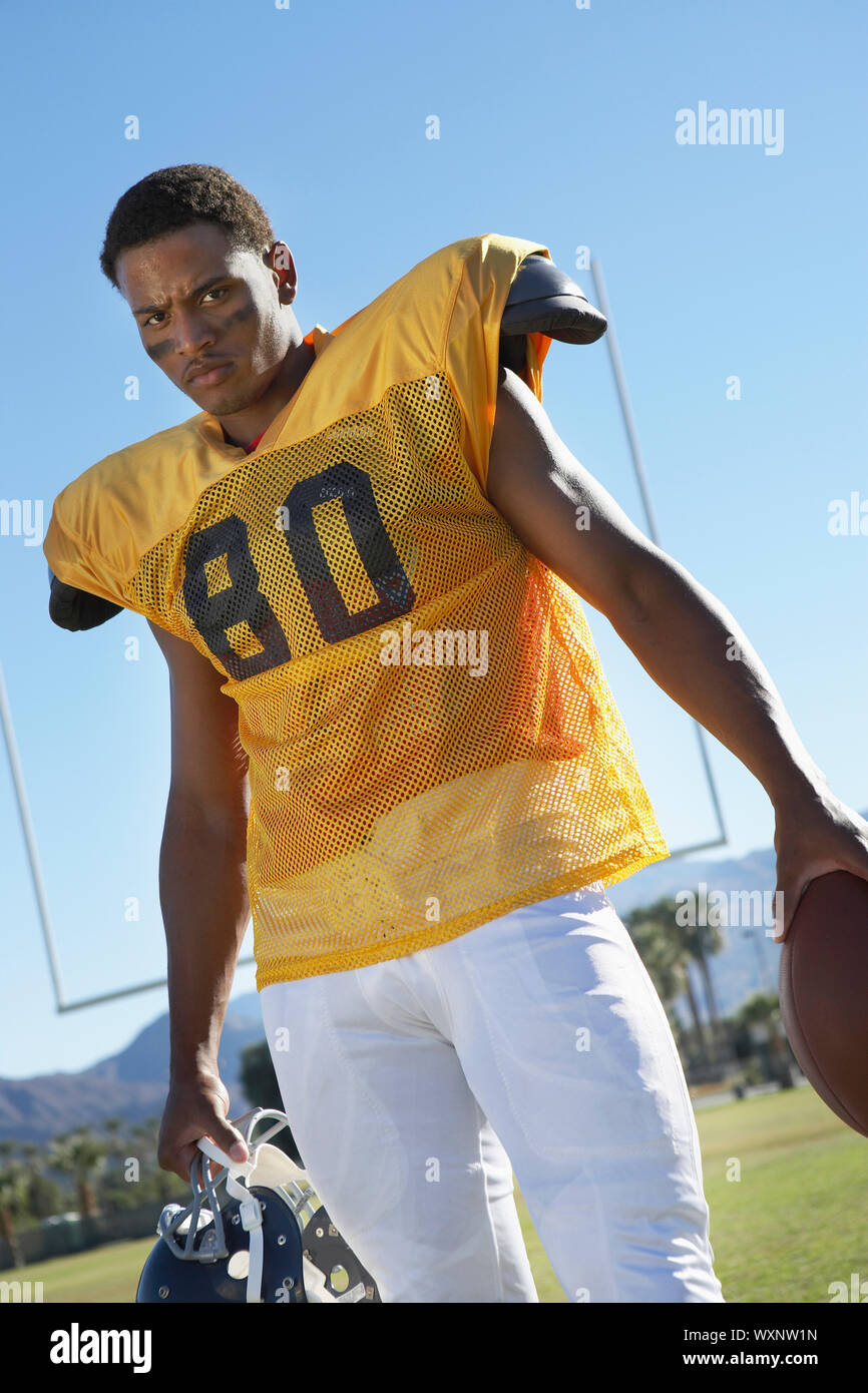 One portrait black half football hi-res stock photography and images ...