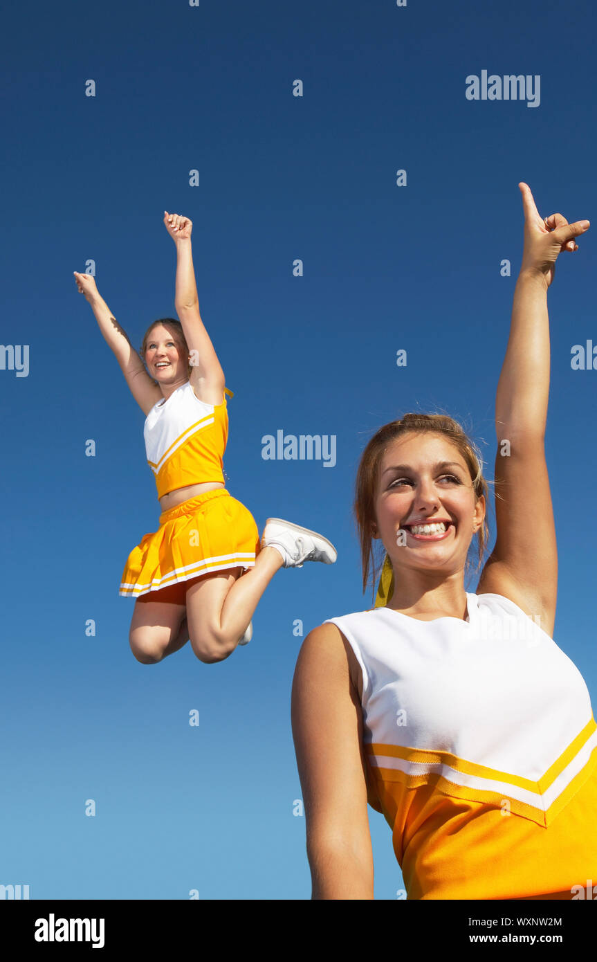 Young cheerleader man jumping hi-res stock photography and images - Alamy