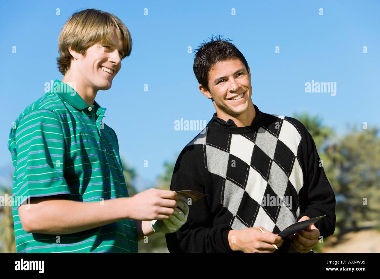 Friends Golfing Together Stock Photo - Alamy