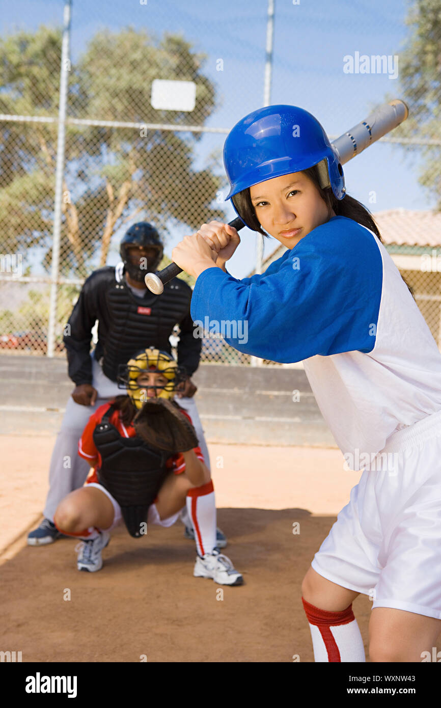 Softball Player at Bat Stock Photo - Alamy