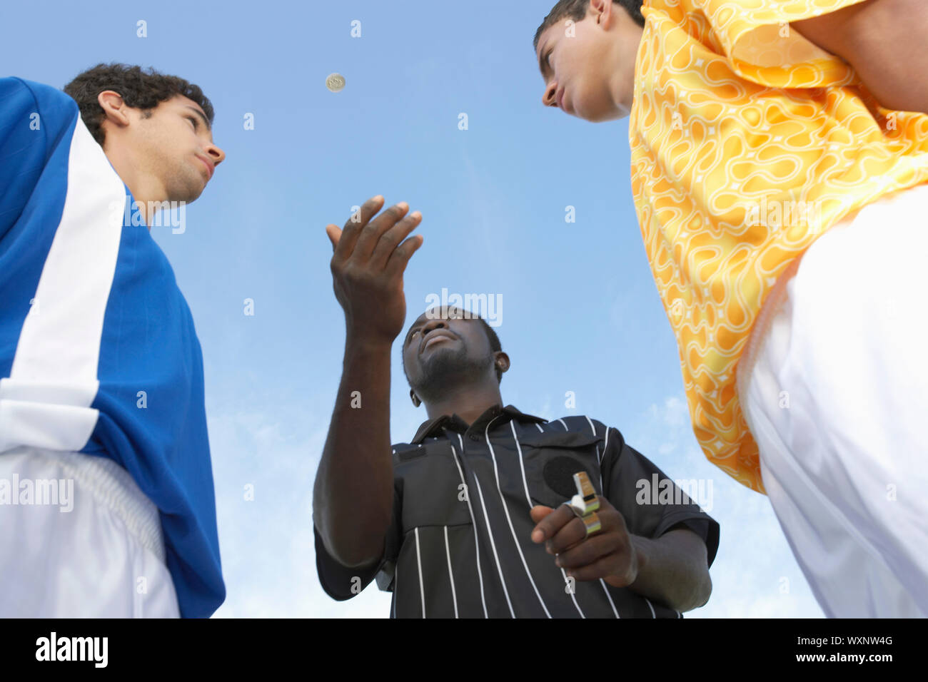 Flipping a coin hi-res stock photography and images - Alamy