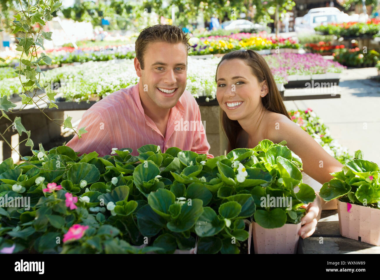 Happy Couple at Plant Nursery Stock Photo - Alamy