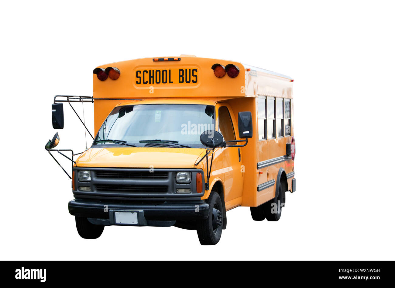 A yellow isolated school bus on white Stock Photo - Alamy