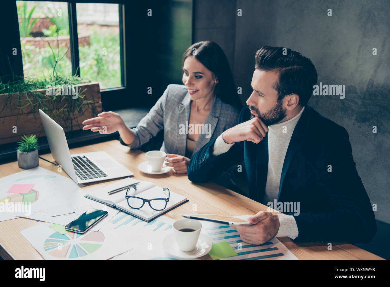 Two cheerful modern professional stylish elegant people, leaders Stock ...