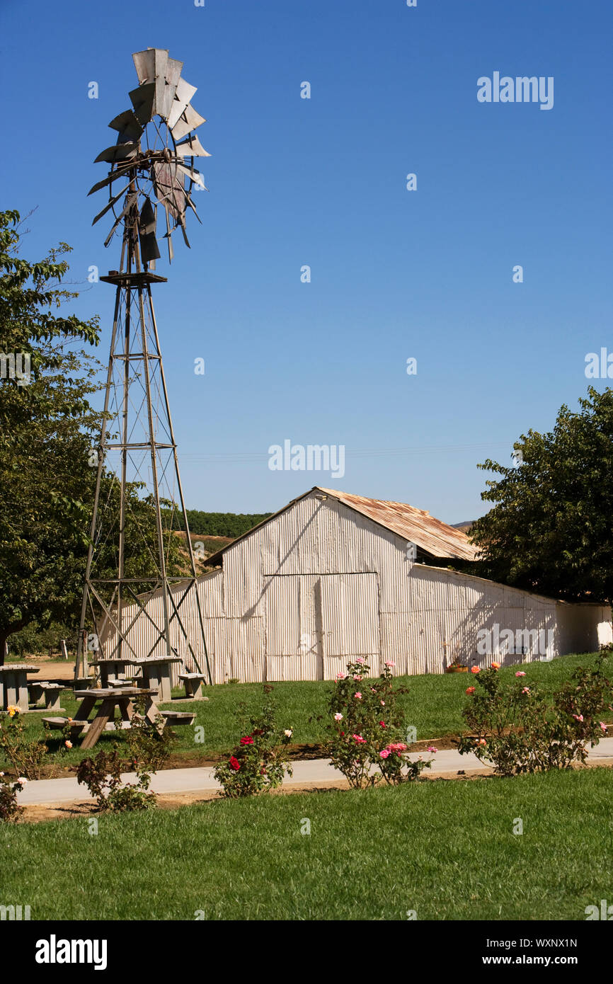 Barn and windmill Stock Photo - Alamy