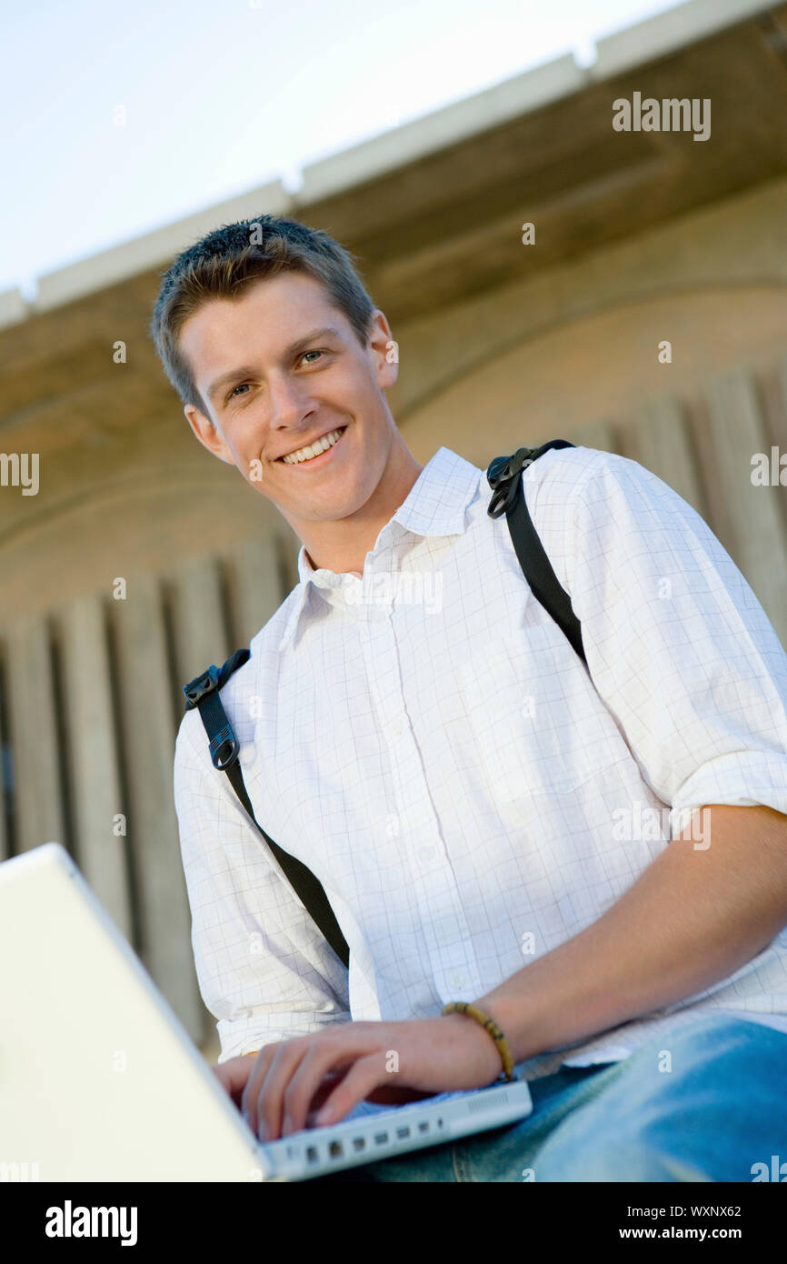 Student Using Laptop Outside Stock Photo - Alamy
