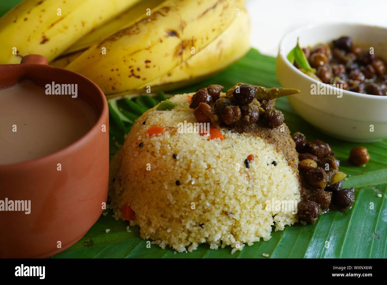 Rva Upma/Uppuma served with black Channa or Kadala curry banana and tea ...