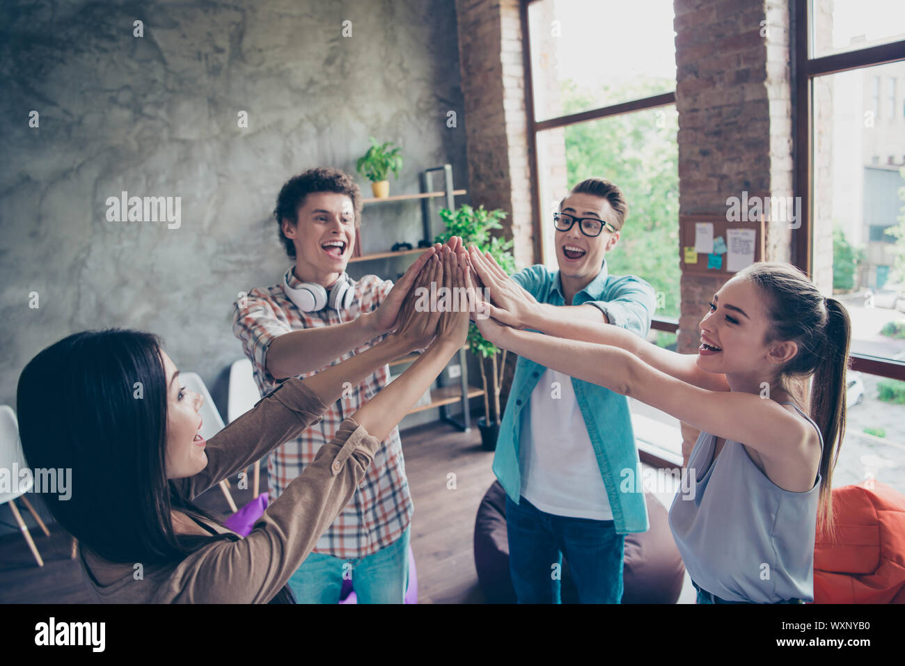 United company. Four adorable smart, clever, intelligent, stylis Stock ...