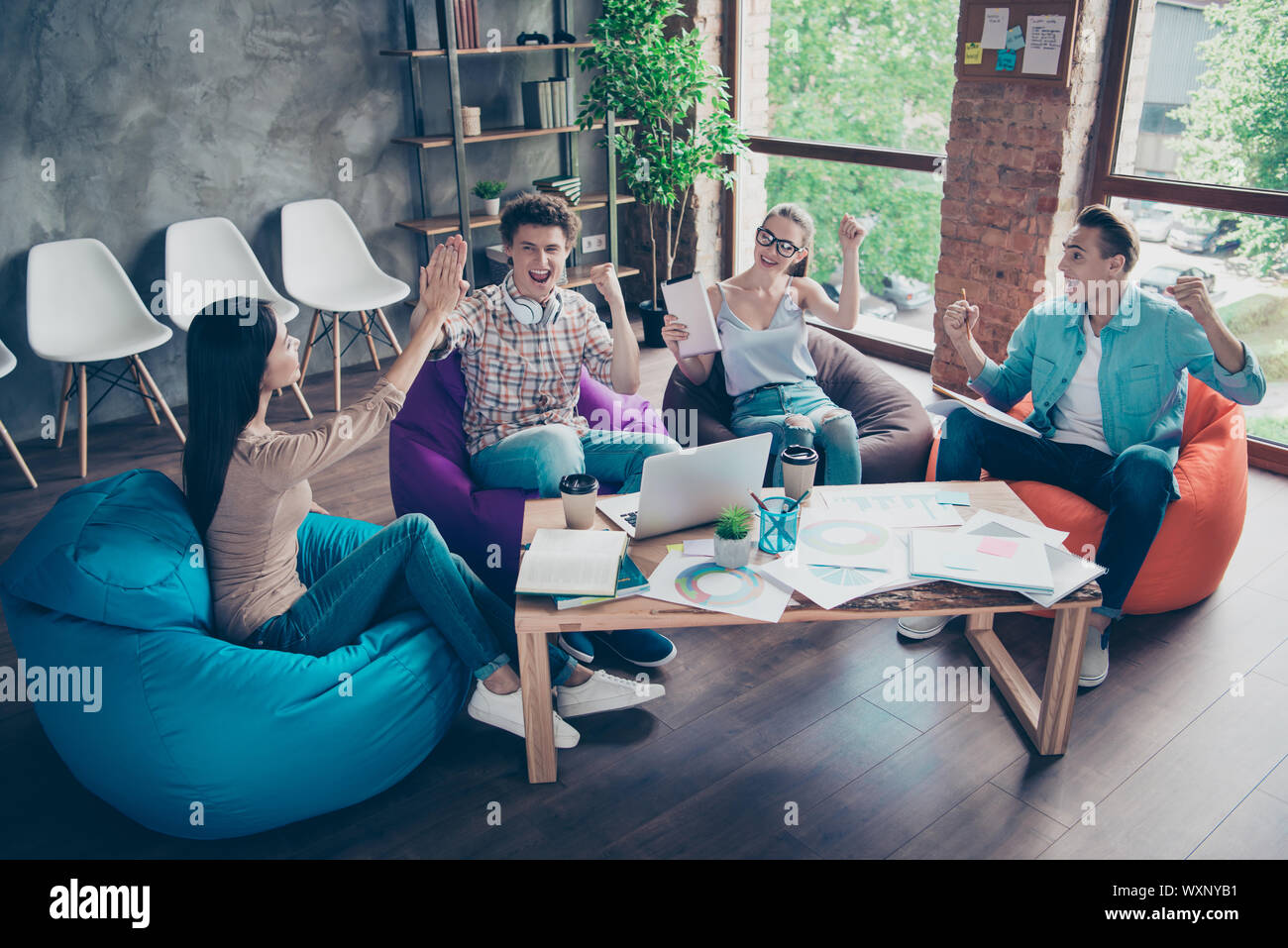 Four smart, clever, intelligent, adorable, stylish people in cas Stock ...