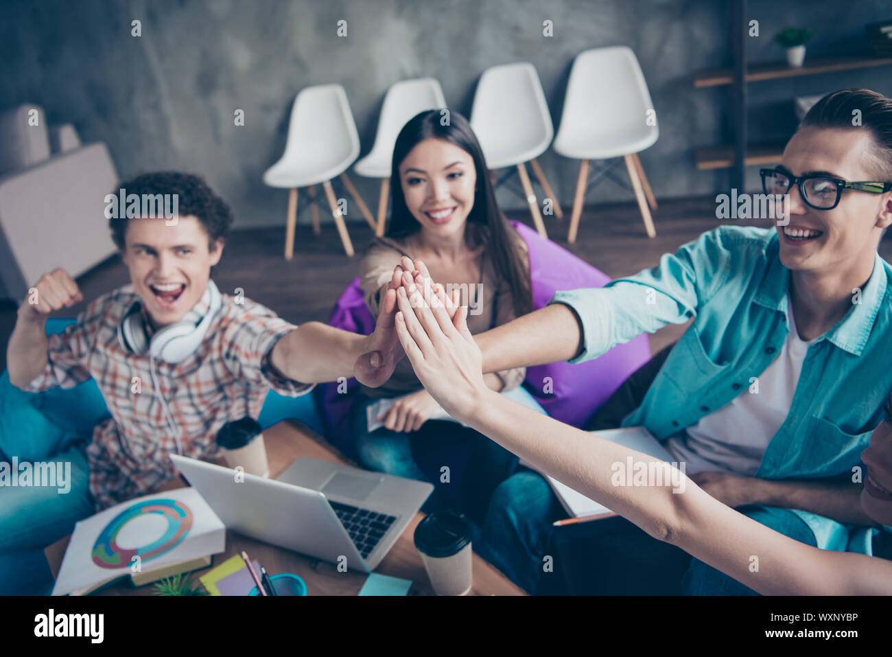 Successful unity, company progress, winning. Four adorable smart Stock ...