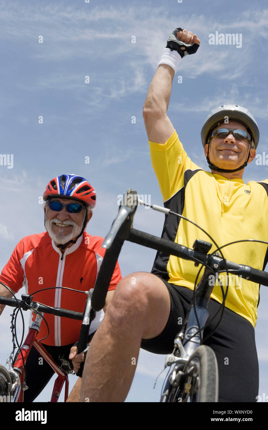 Senior men cycling Stock Photo - Alamy