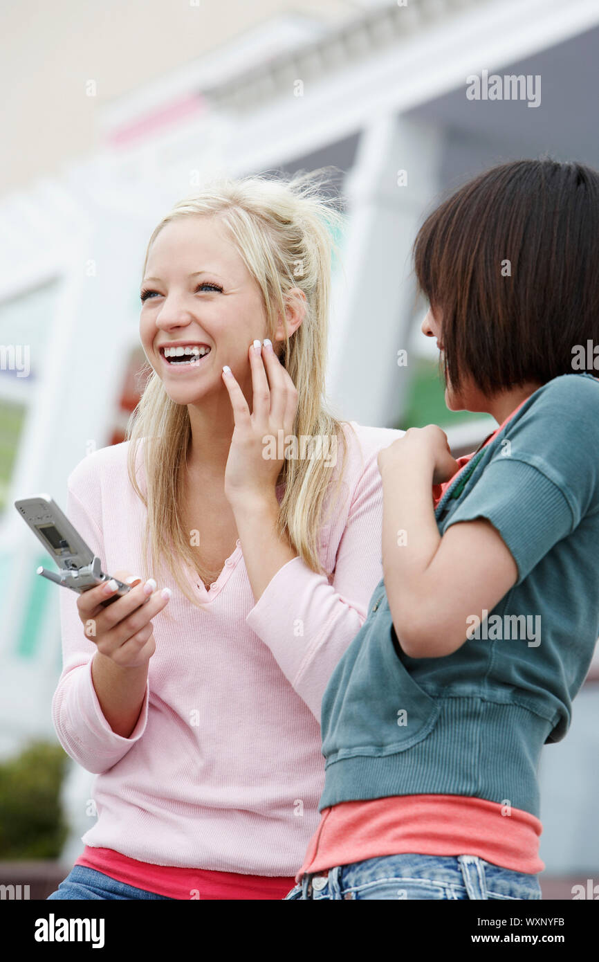 Girls with Cell Phone Stock Photo - Alamy