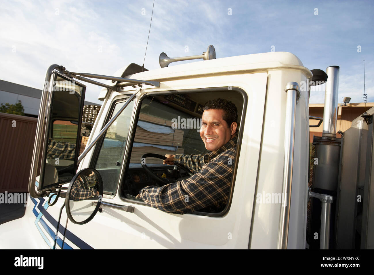 Truck Driver Behind the Wheel Stock Photo - Alamy