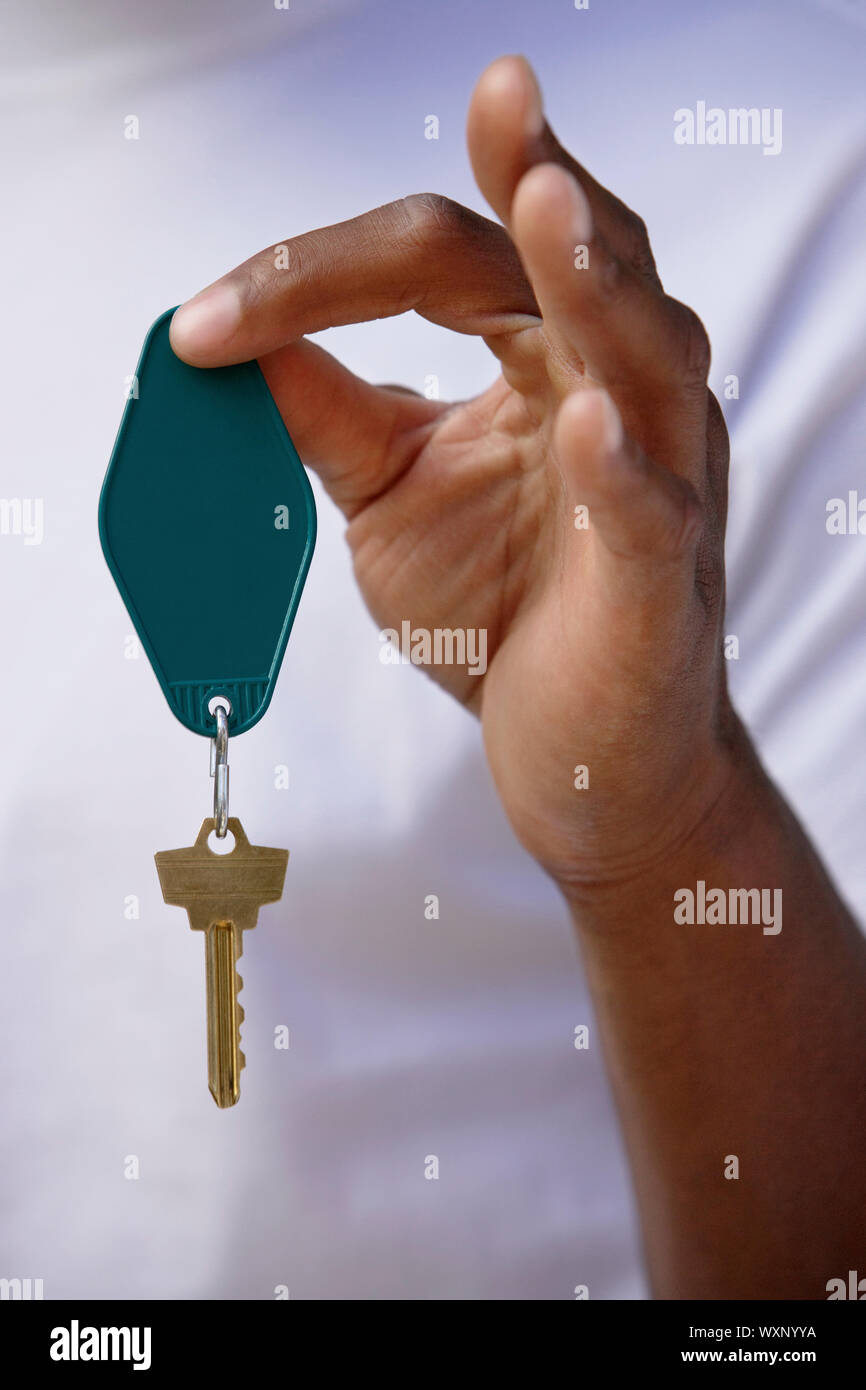 Hand Holding Key Stock Photo - Alamy