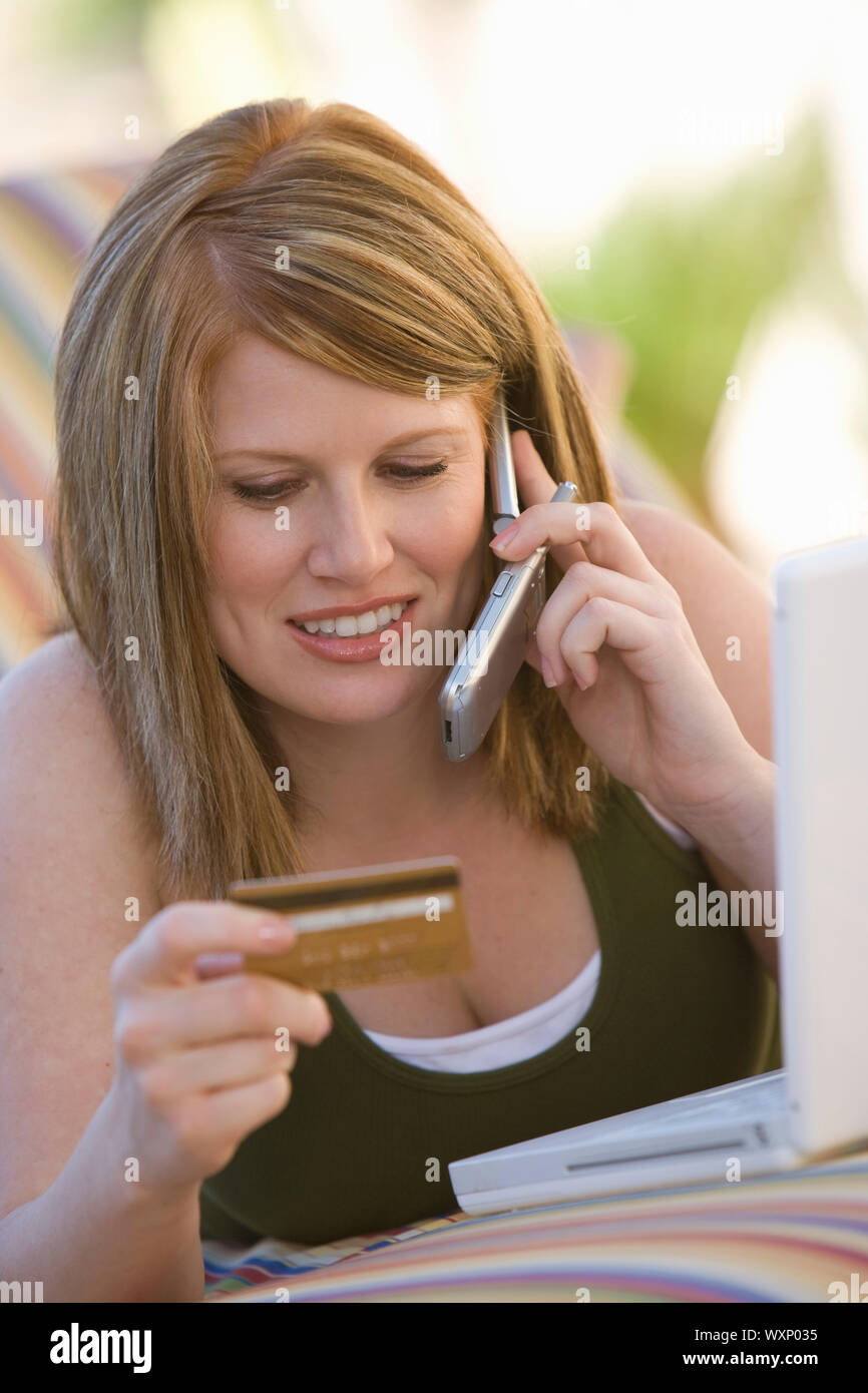 Woman Making Credit Card Purchase Stock Photo - Alamy