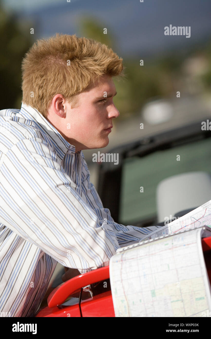Man Looking at Road Map Stock Photo - Alamy