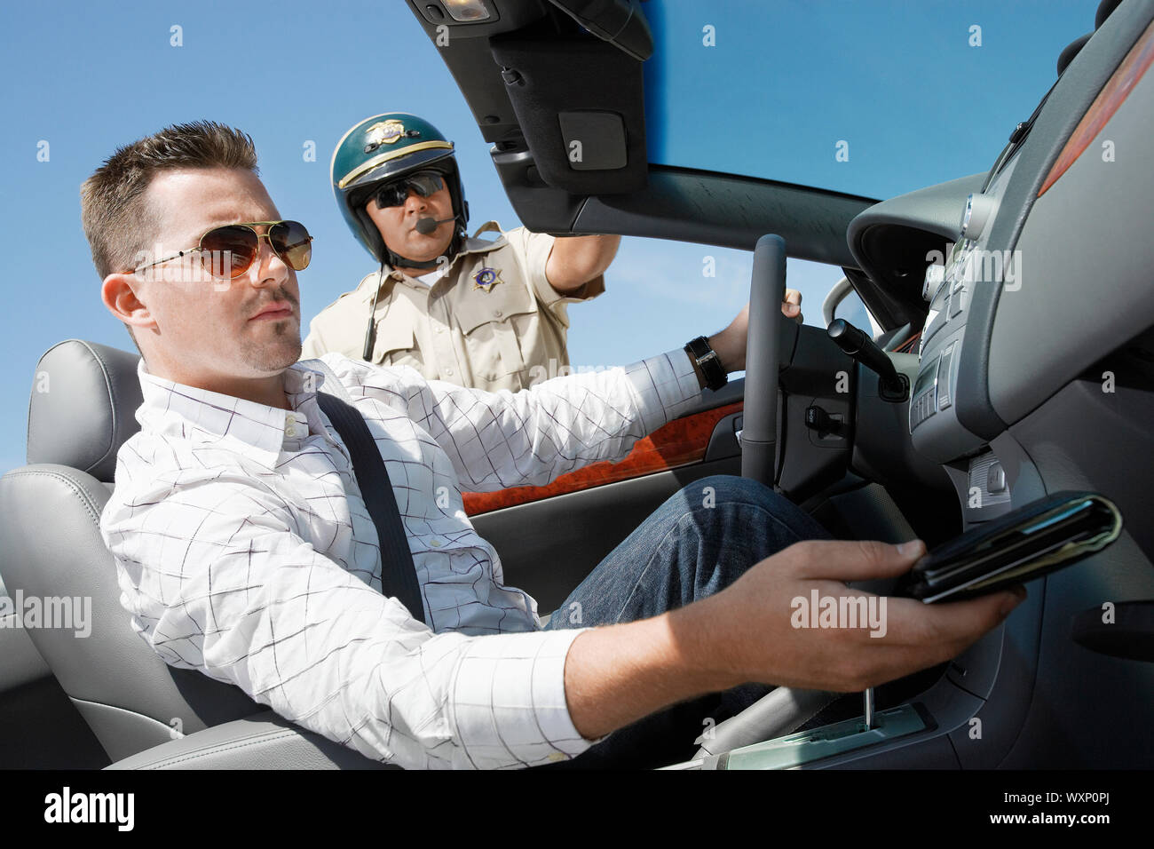 Police Officer Asking for Drivers License Stock Photo - Alamy