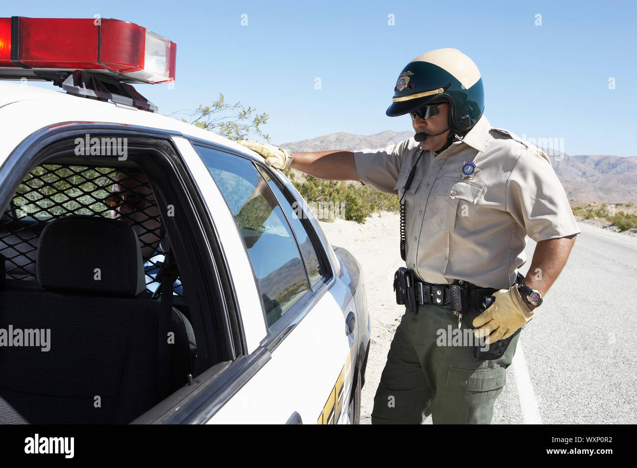 Police Officer Arresting a Man Stock Photo - Alamy