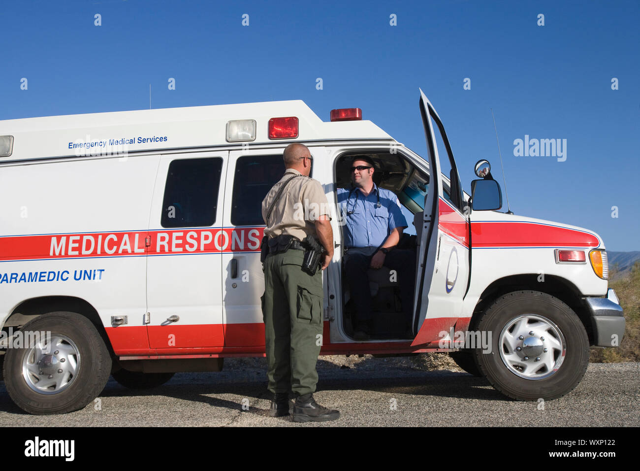 Police officer paramedic standing hi-res stock photography and images ...