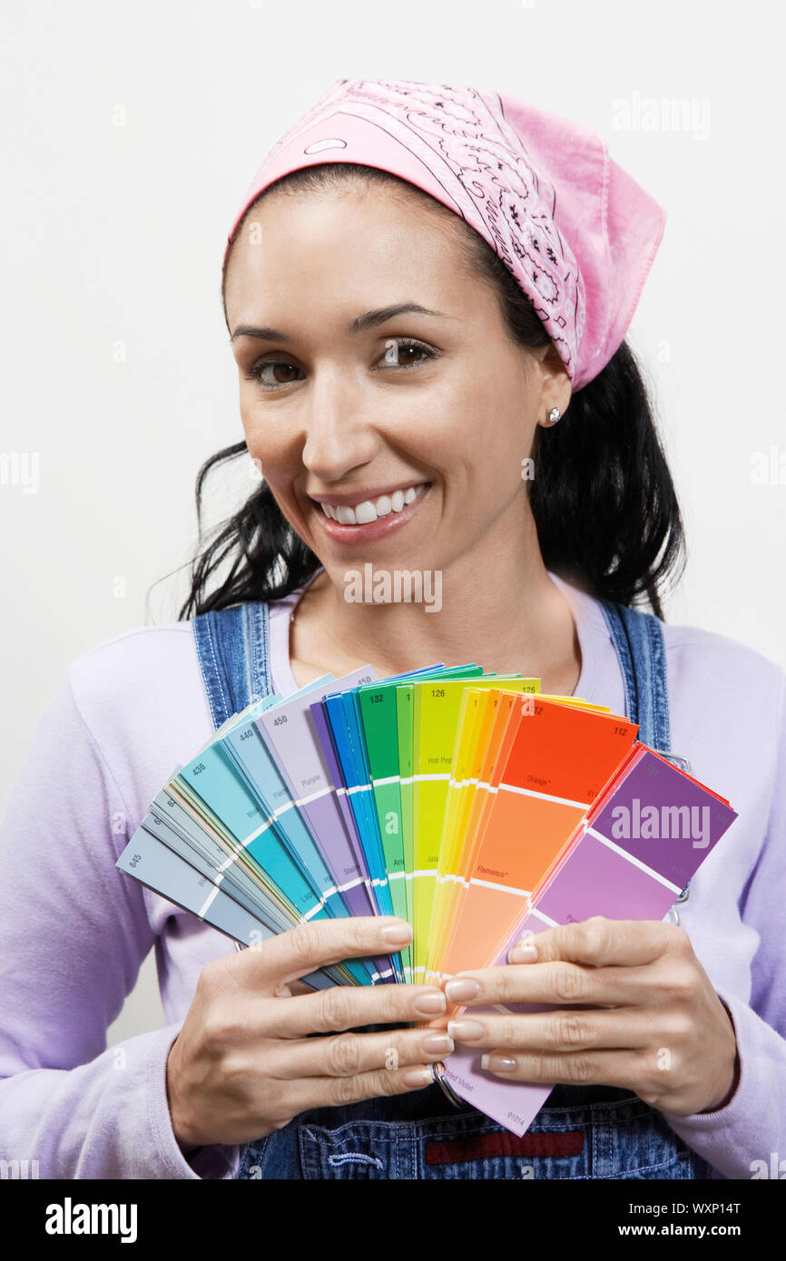 Woman Choosing Paint Color Stock Photo - Alamy