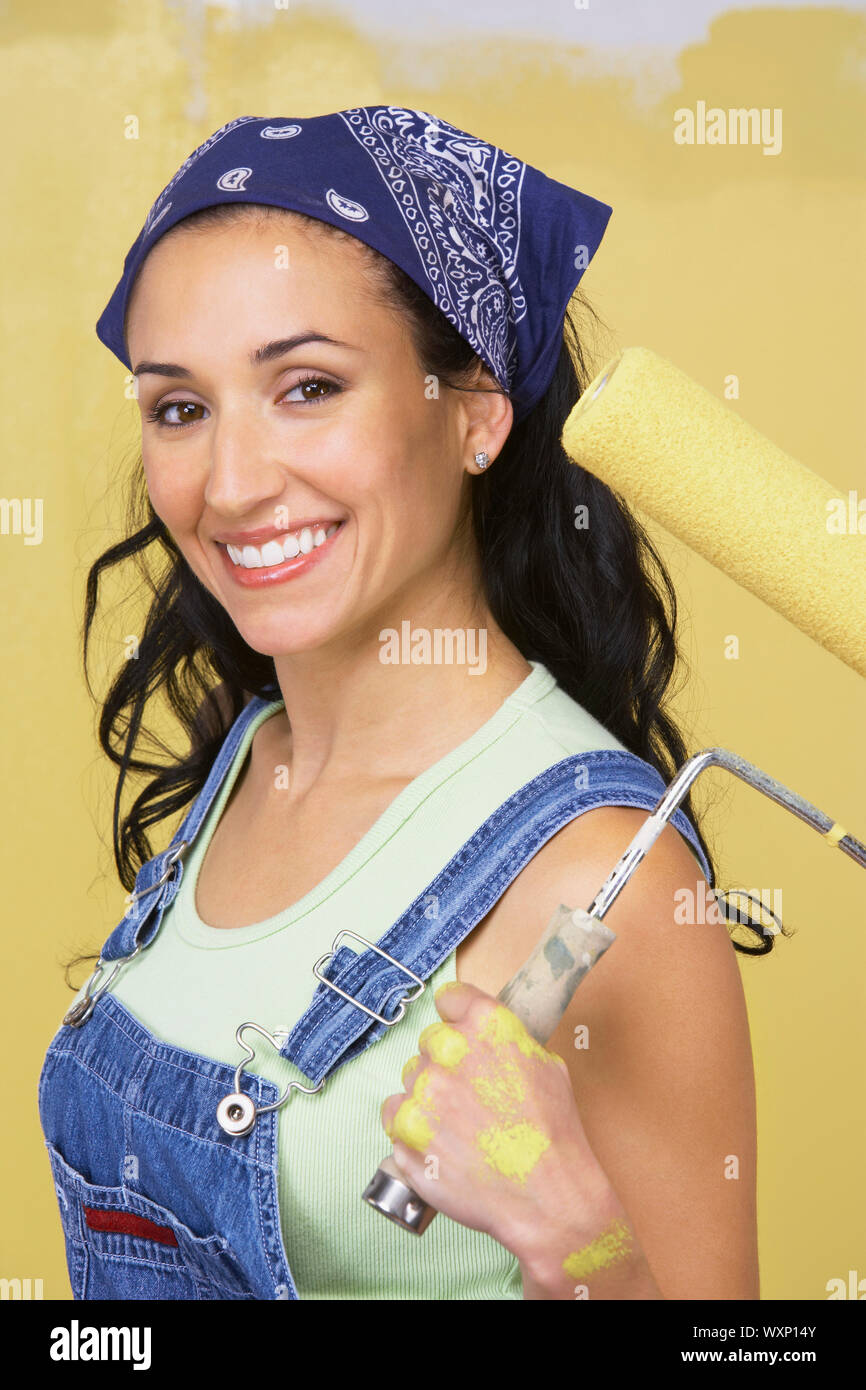 Woman Holding Paint Roller Stock Photo - Alamy