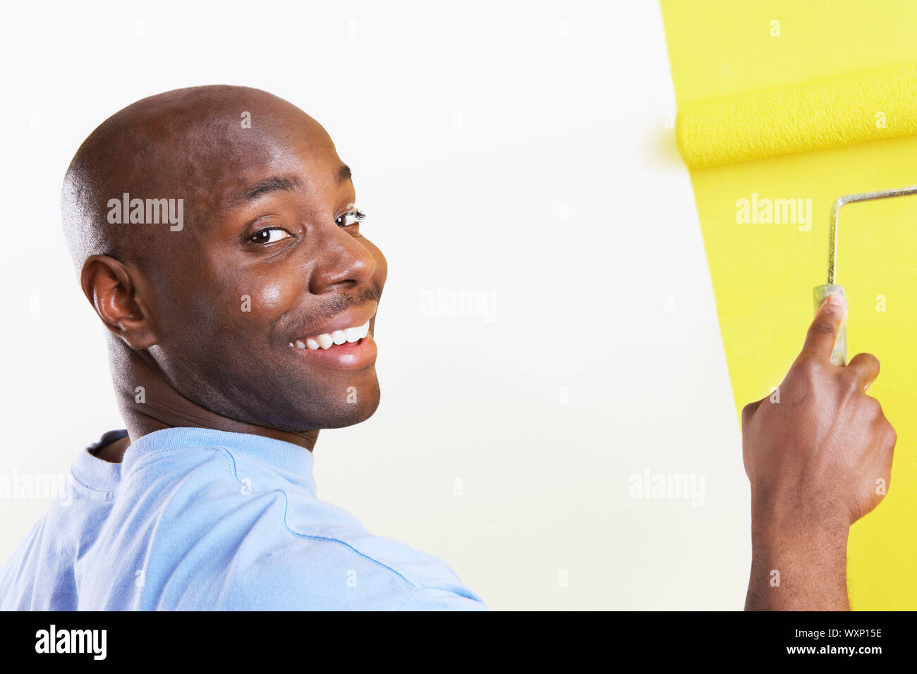 Man Painting Wall Yellow Stock Photo - Alamy