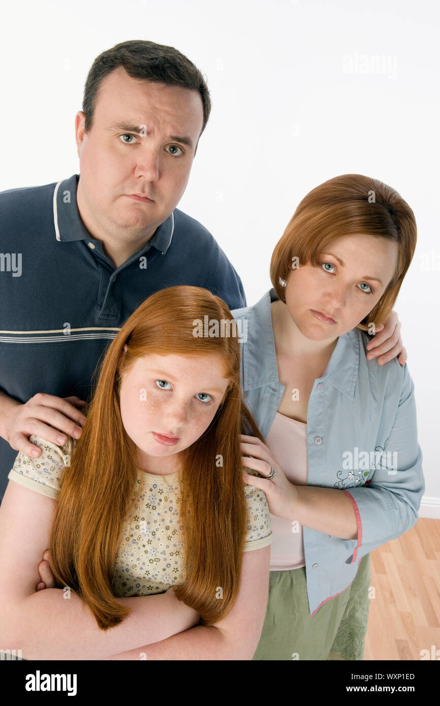 Portrait of sad family Stock Photo - Alamy