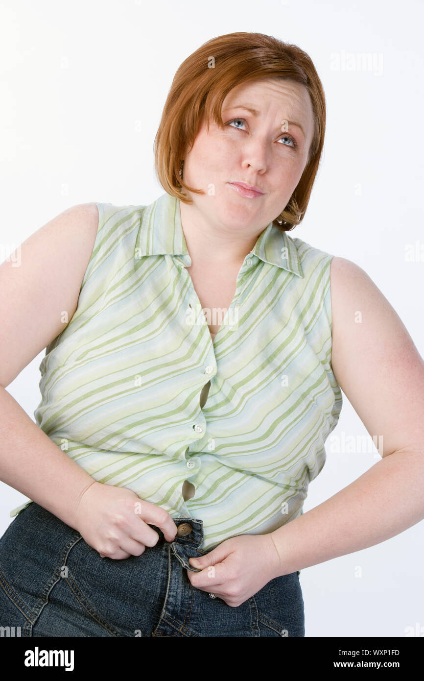 Studio portrait of overweight woman Stock Photo - Alamy