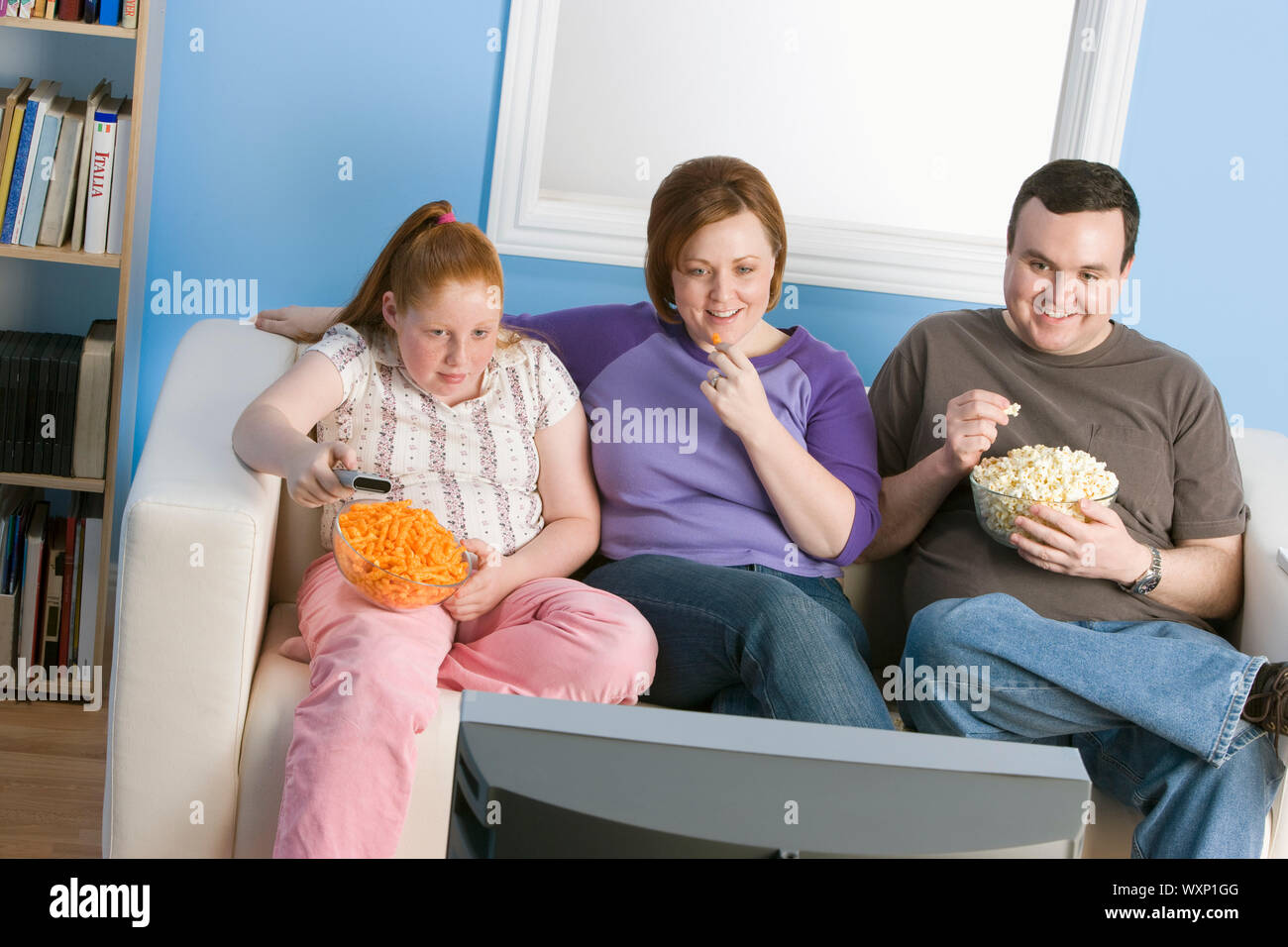 Fat family sofa food hi-res stock photography and images - Alamy
