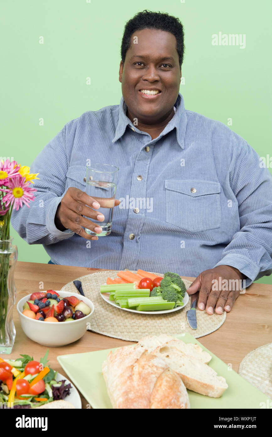 Man Eating Fruits and Vegetables Stock Photo - Alamy