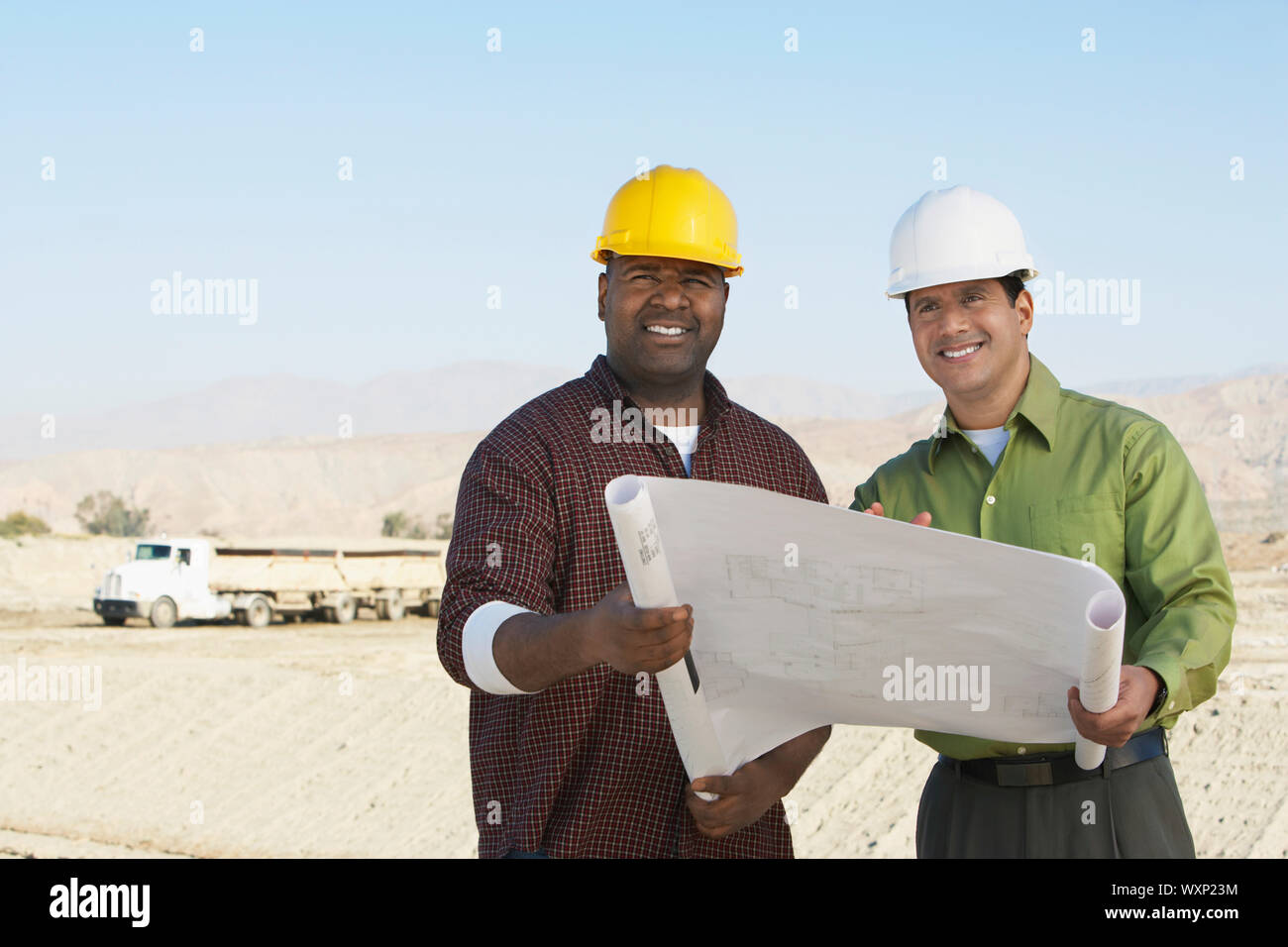 Two Construction Workers on Site Stock Photo - Alamy