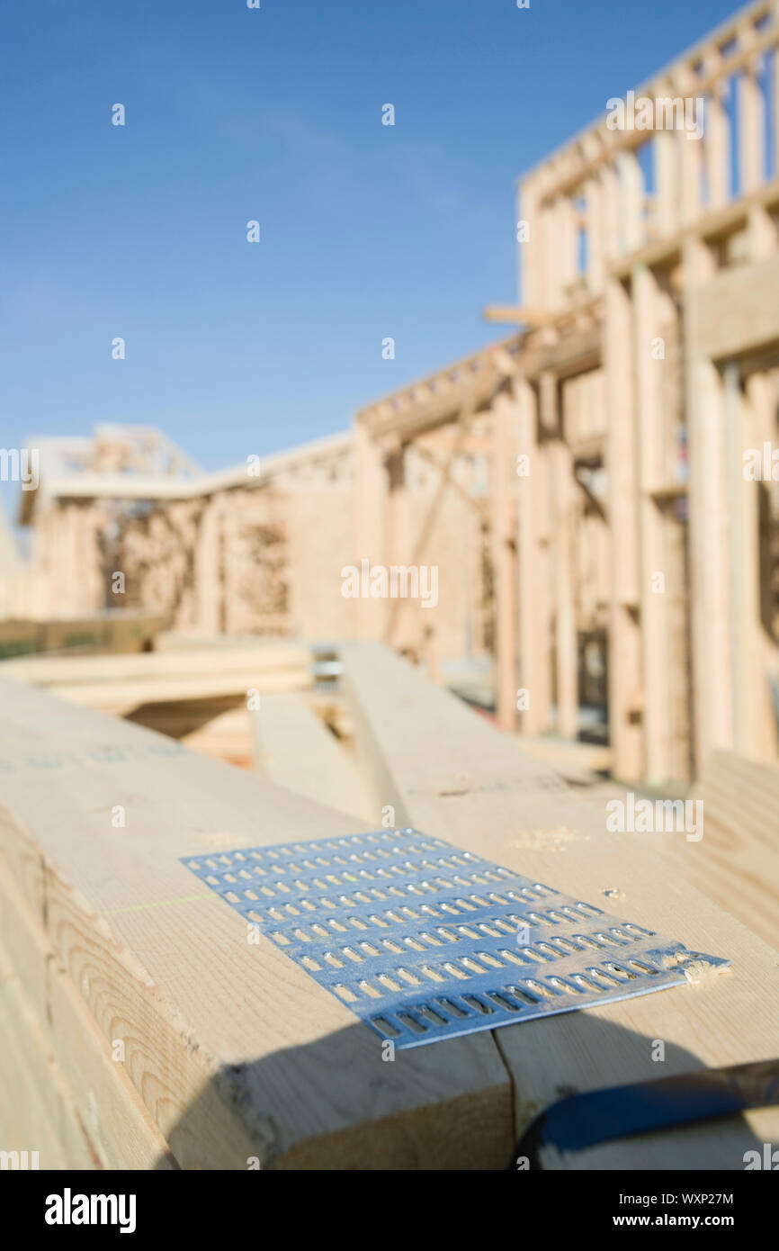 Wooden planks stacked on construction site Stock Photo - Alamy