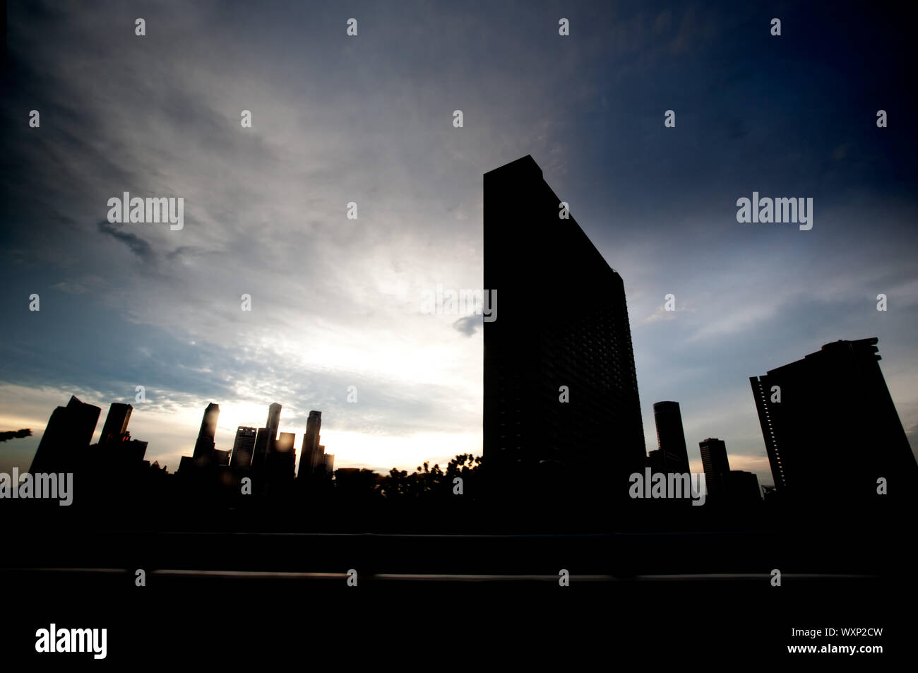 Singapore skyline dark clouds hi-res stock photography and images - Alamy