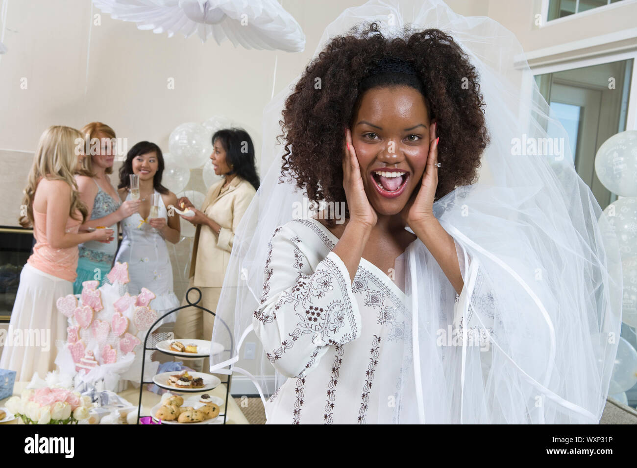 Excited bride wearing veil hi-res stock photography and images - Alamy
