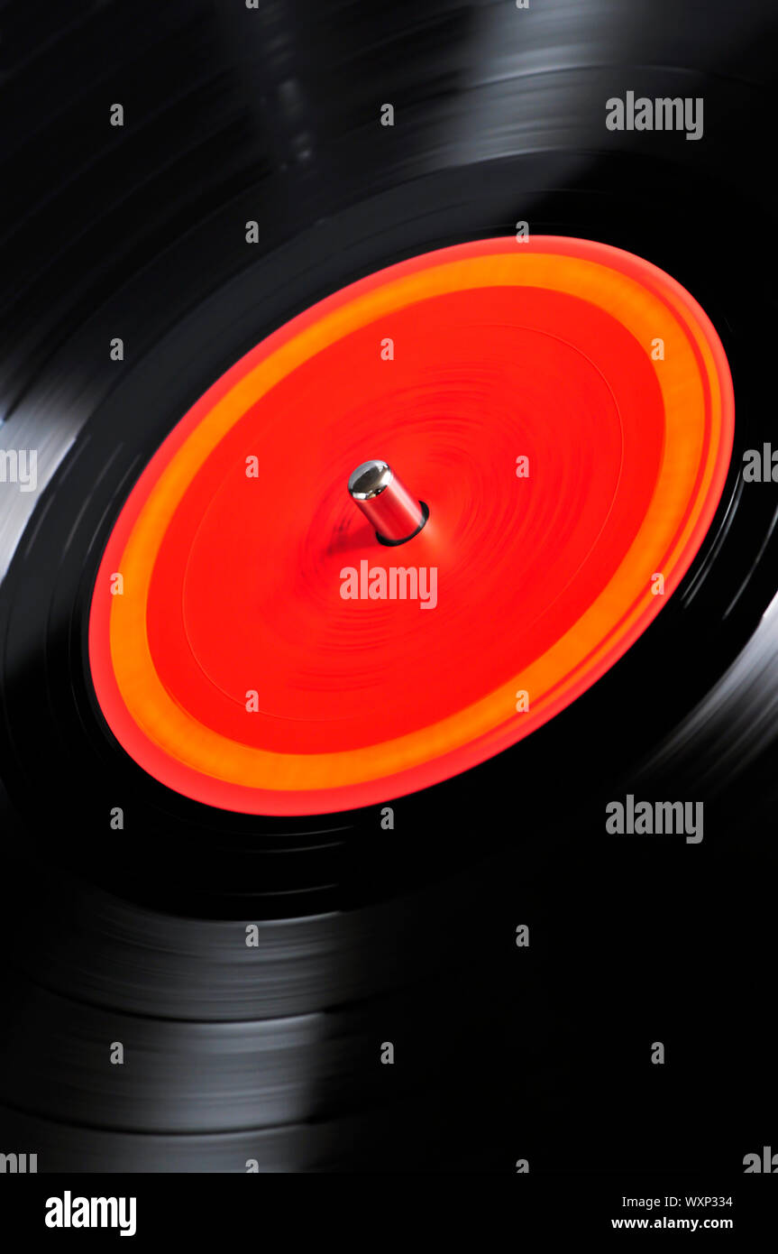 Vinyl record spinning on turntable close up Stock Photo - Alamy