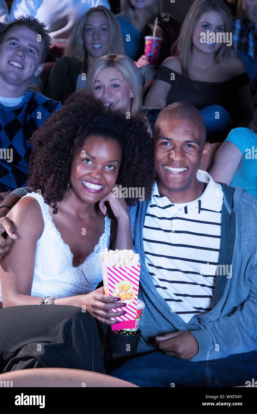 Couple Watching Movie Together in Theater Stock Photo - Alamy