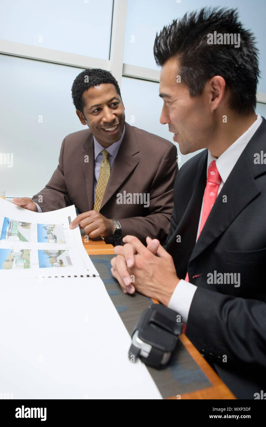 Two businessmen at business meeting Stock Photo - Alamy
