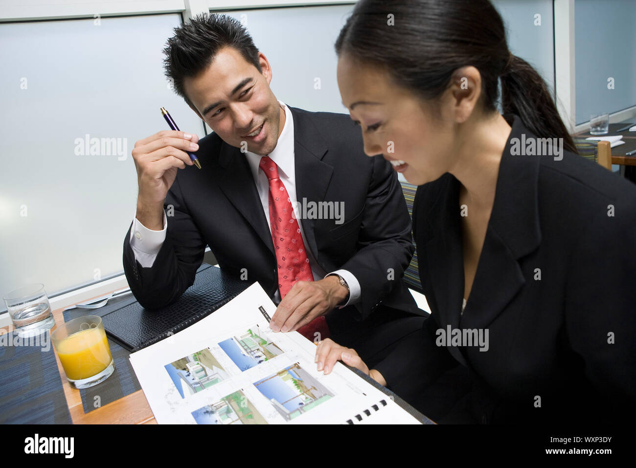 Two business people at business meeting Stock Photo - Alamy