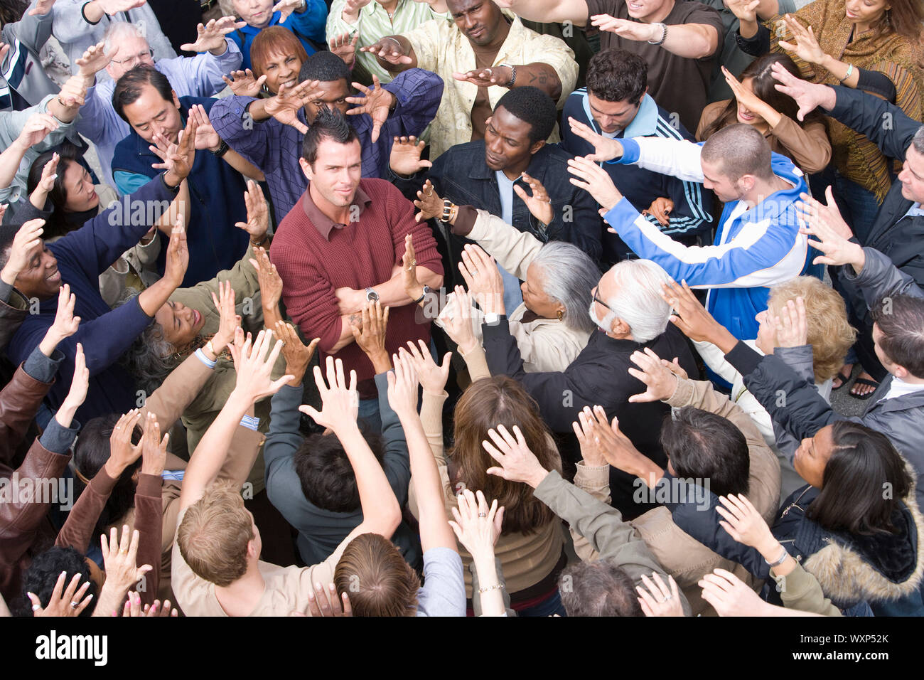 Young Man Surrounded By Crowd Stock Photo Alamy young-man-surrounded-by-crowd-stock-photo-alamy