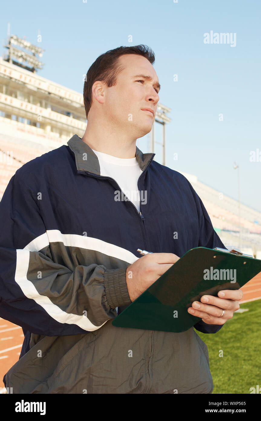 Coach clipboard observing hi-res stock photography and images - Alamy