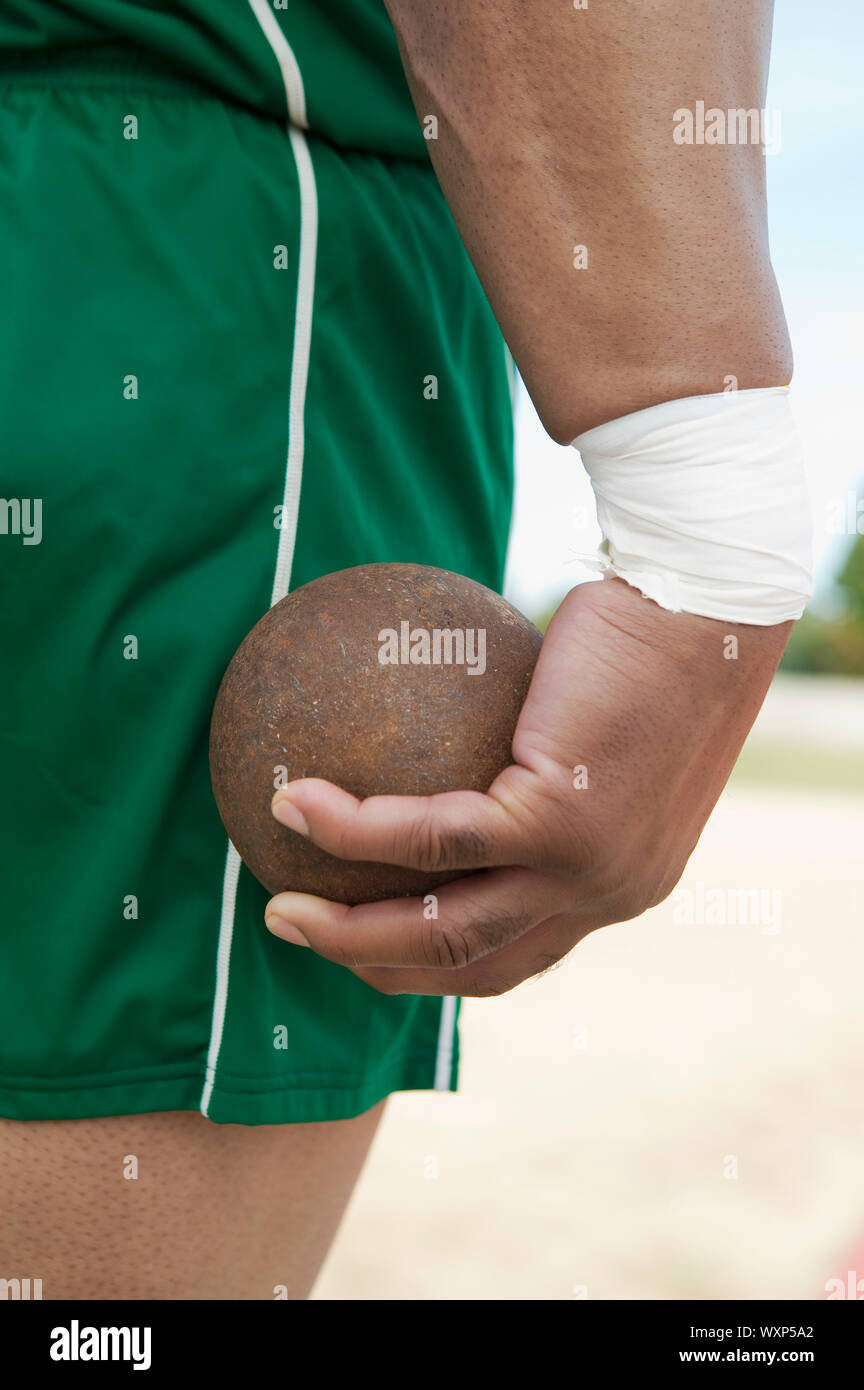 Male shot putter holding shot hi-res stock photography and images - Alamy