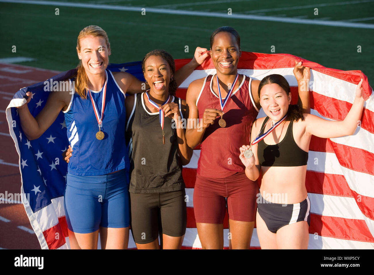 Female athletes team celebrating hi-res stock photography and images ...