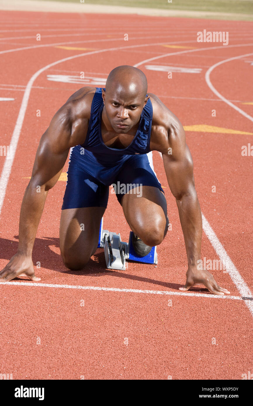 Athlete ready to run Stock Photo - Alamy