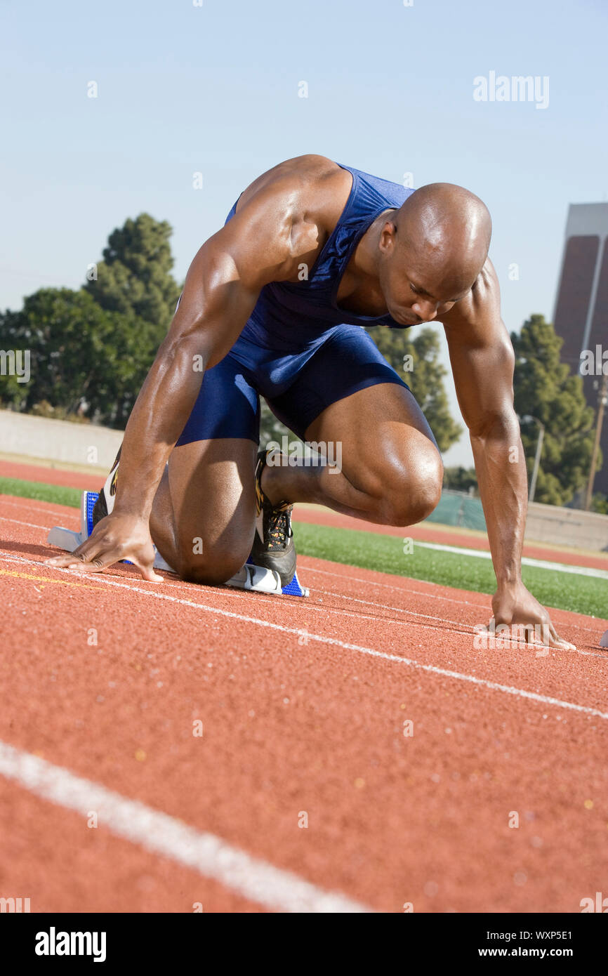 Athlete ready to run Stock Photo - Alamy