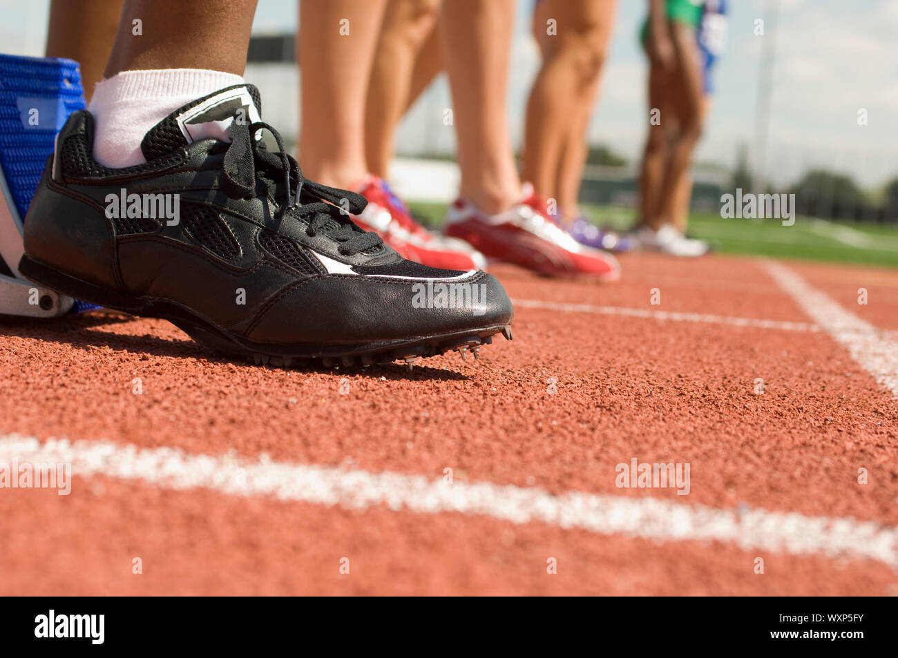 Female athletes in starting blocks hi-res stock photography and images ...