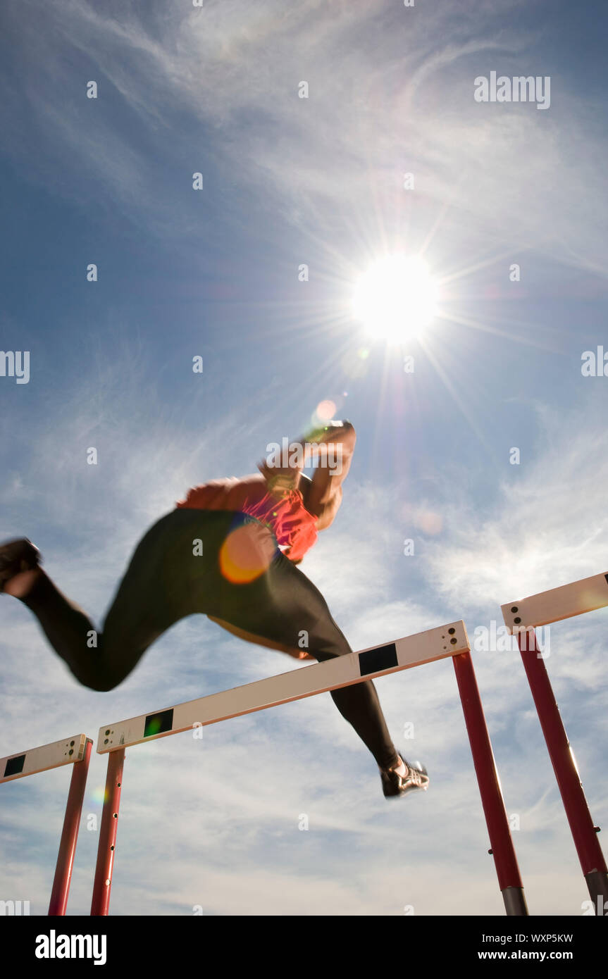 Hurdle running legs hi-res stock photography and images - Alamy