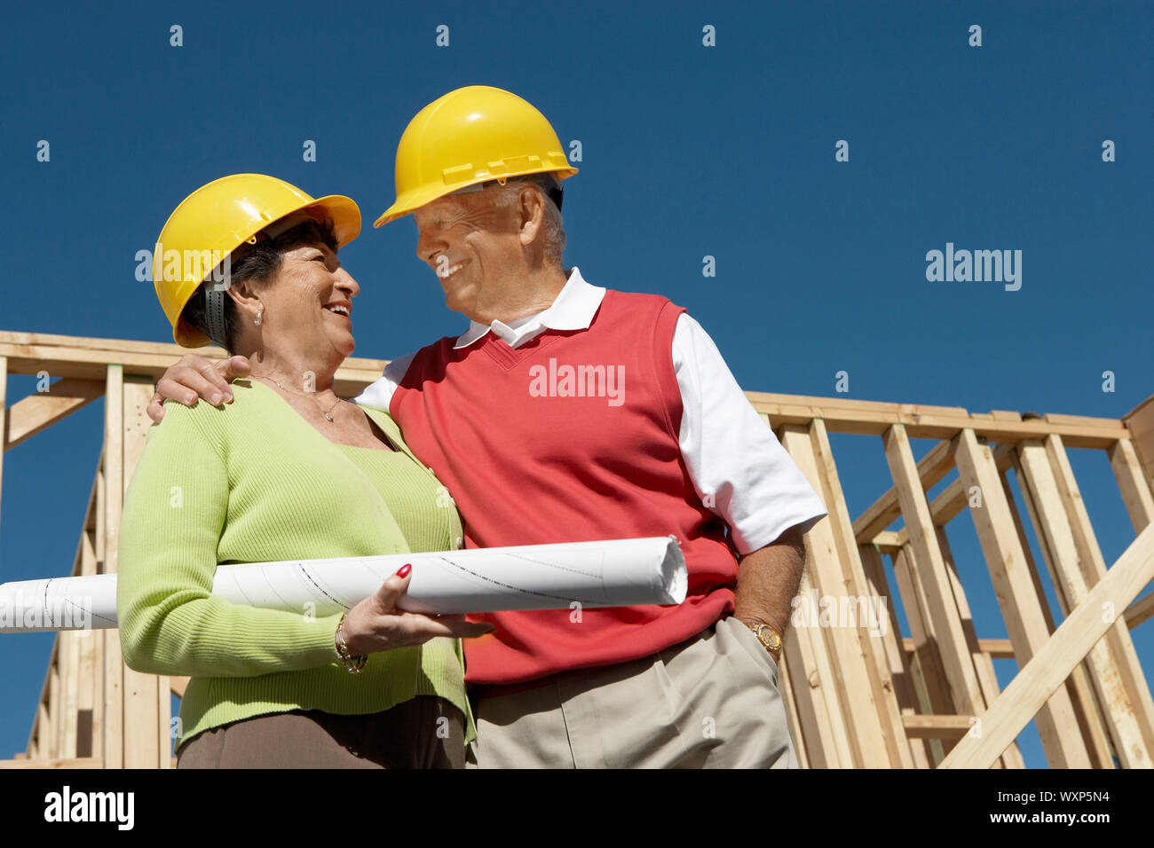 Couple Having Their House Built Stock Photo - Alamy