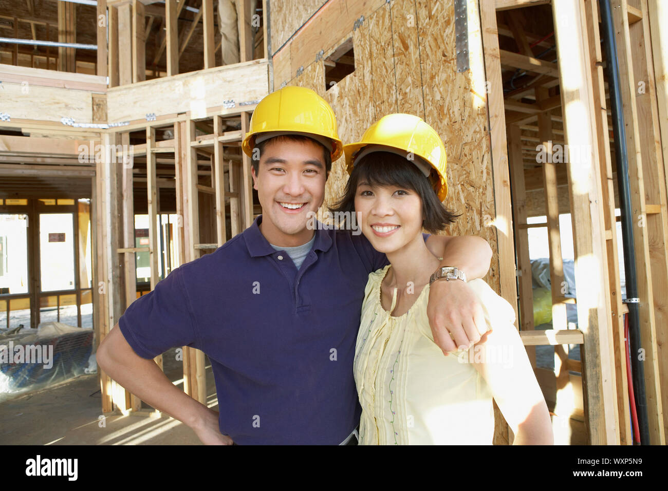 Couple Having Their House Built Stock Photo - Alamy